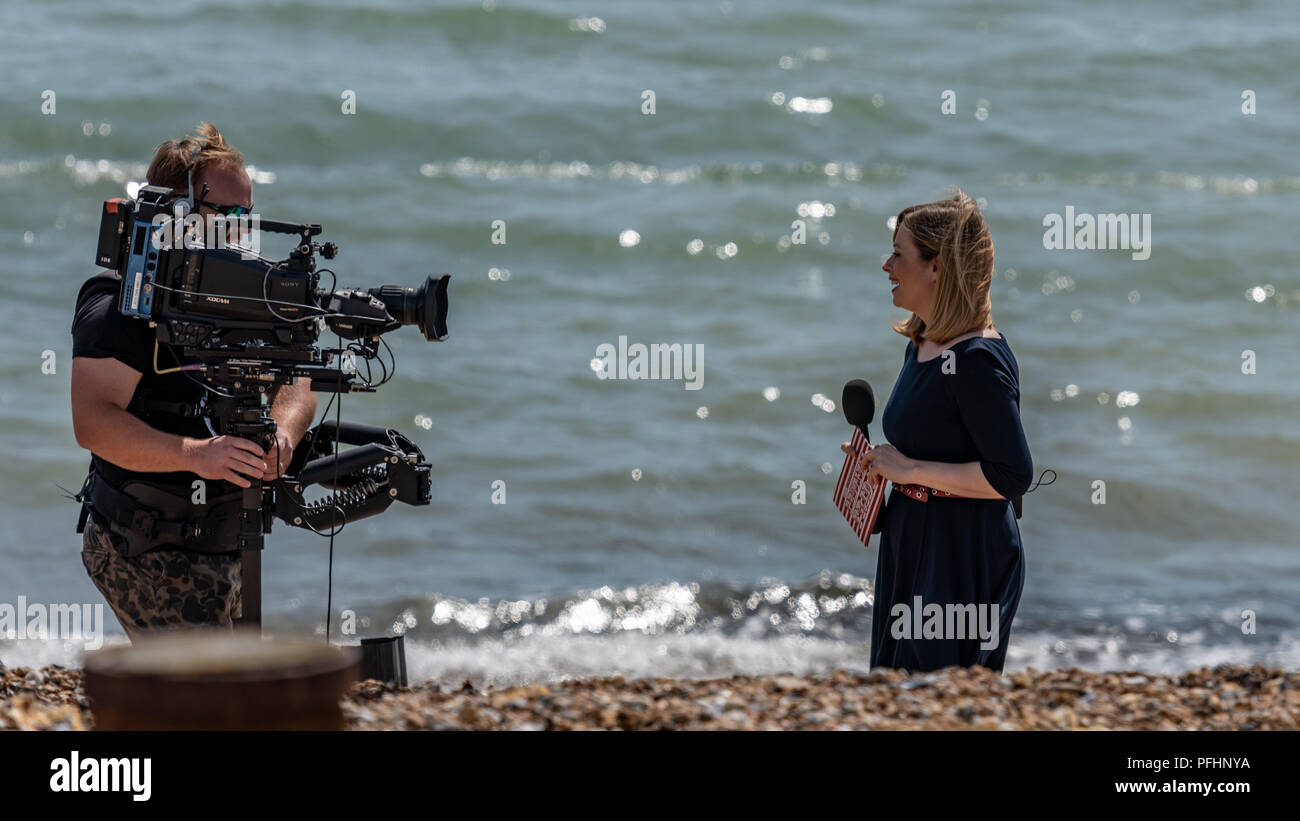 Tv presenter beach hi-res stock photography and images - Alamy