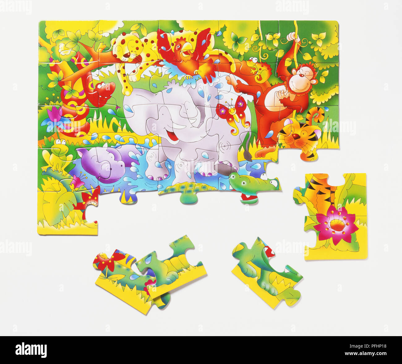 Jigsaw puzzle of jungle scene, unfinished Stock Photo - Alamy