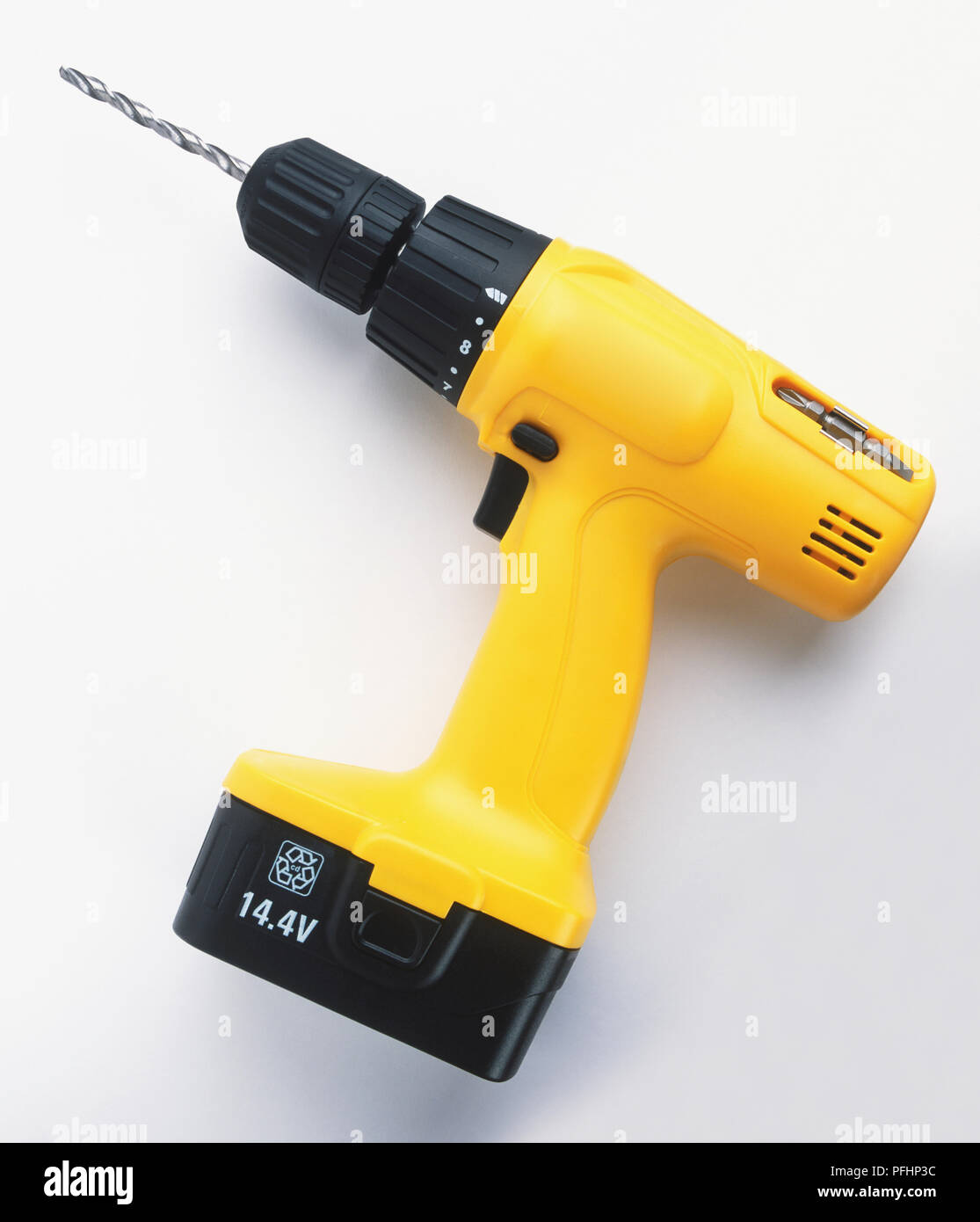 Yellow hand drill, side view Stock Photo - Alamy