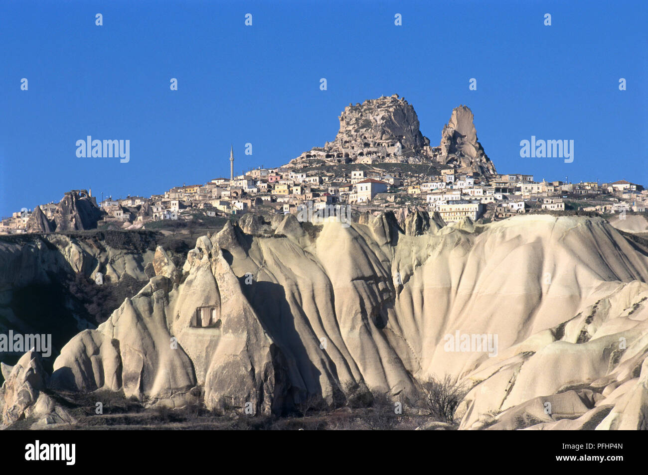 Turkey, Anatolia, Cappadocia, view of Uchisar village with cave ...