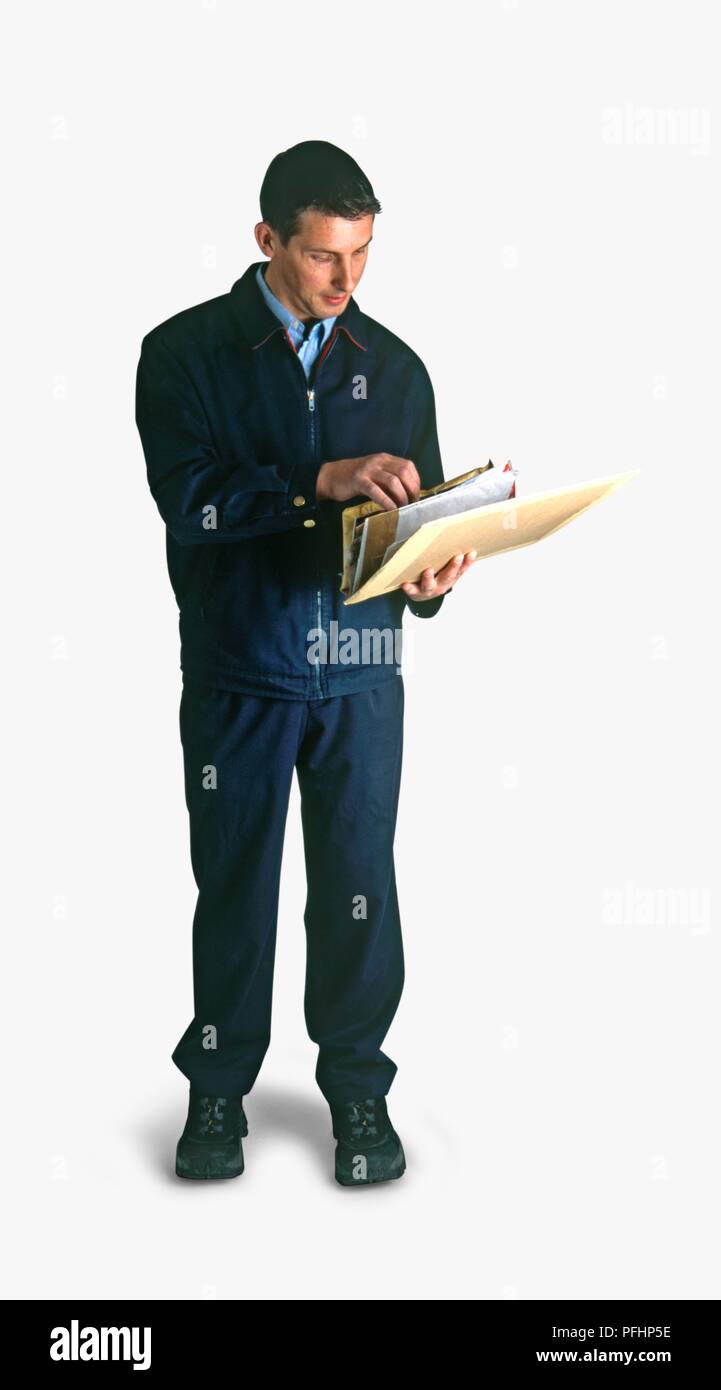 Postman holding a letter hi-res stock photography and images - Alamy