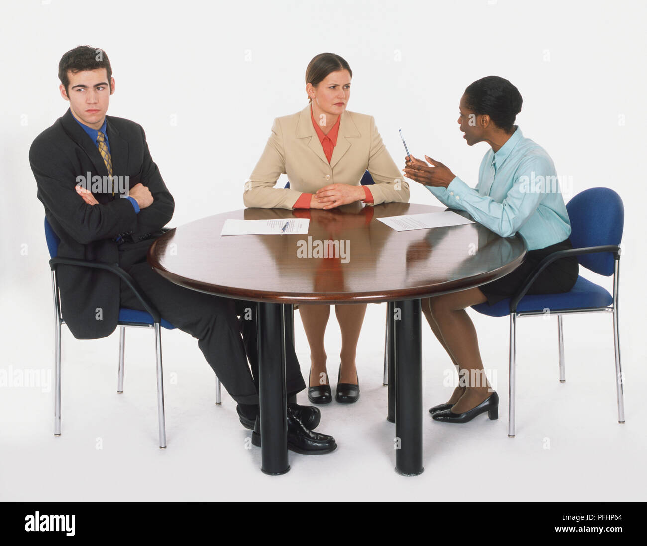 Two people sitting round table hi-res stock photography and images - Alamy