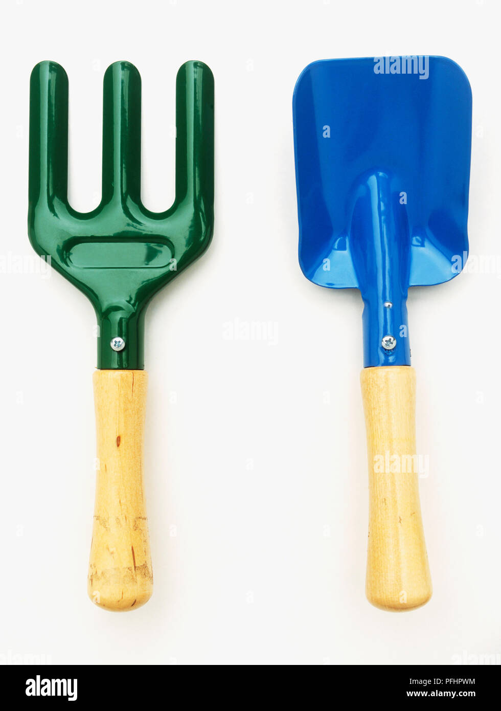 Toy gardening fork and trowel Stock Photo - Alamy