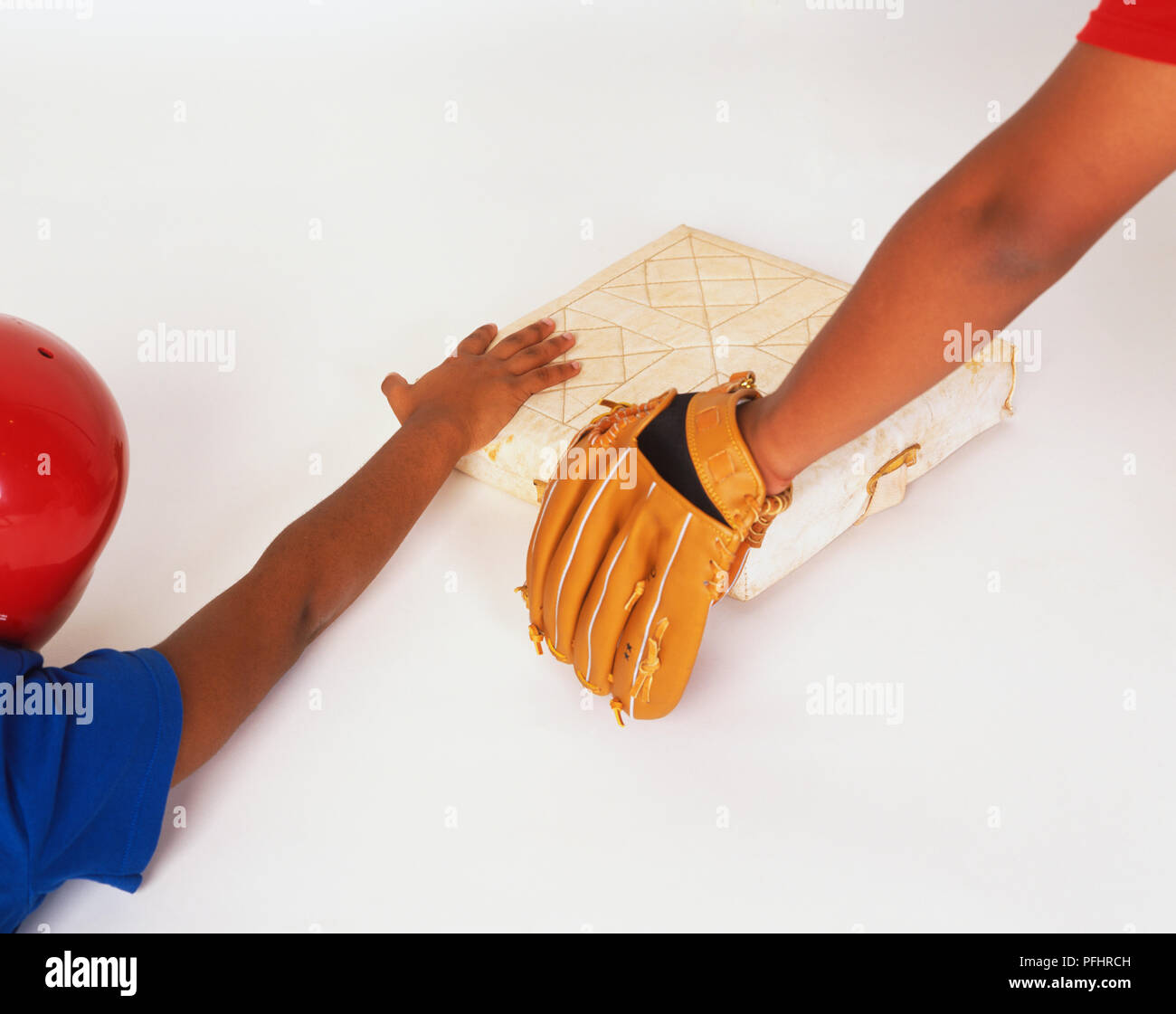 Arm reaching towards base, arm in glove holding base Stock Photo - Alamy