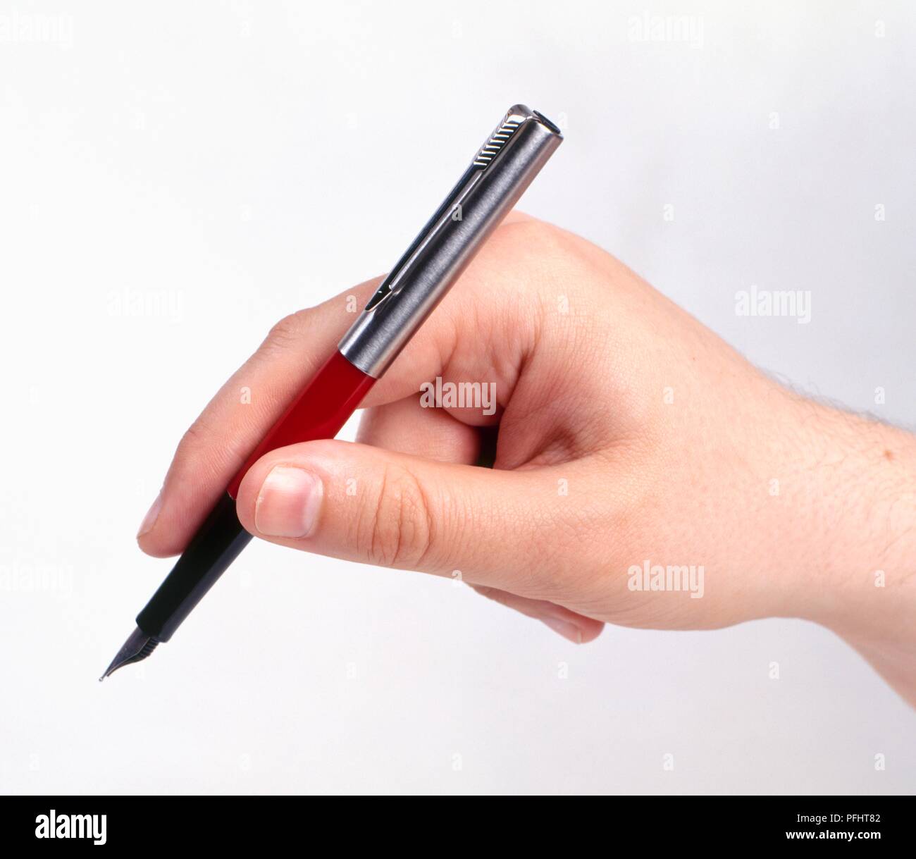 Hand holding fountain pen hi-res stock photography and images - Alamy