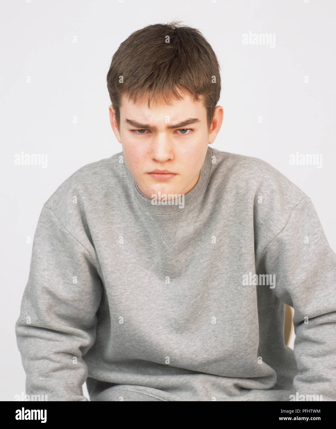 Hunched shoulders hi-res stock photography and images - Alamy