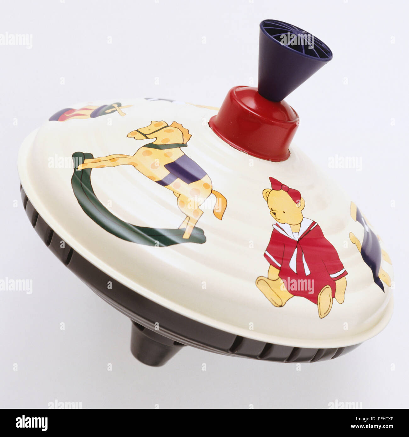 Spinning top decorated with illustrations of toy-animals resting at ...