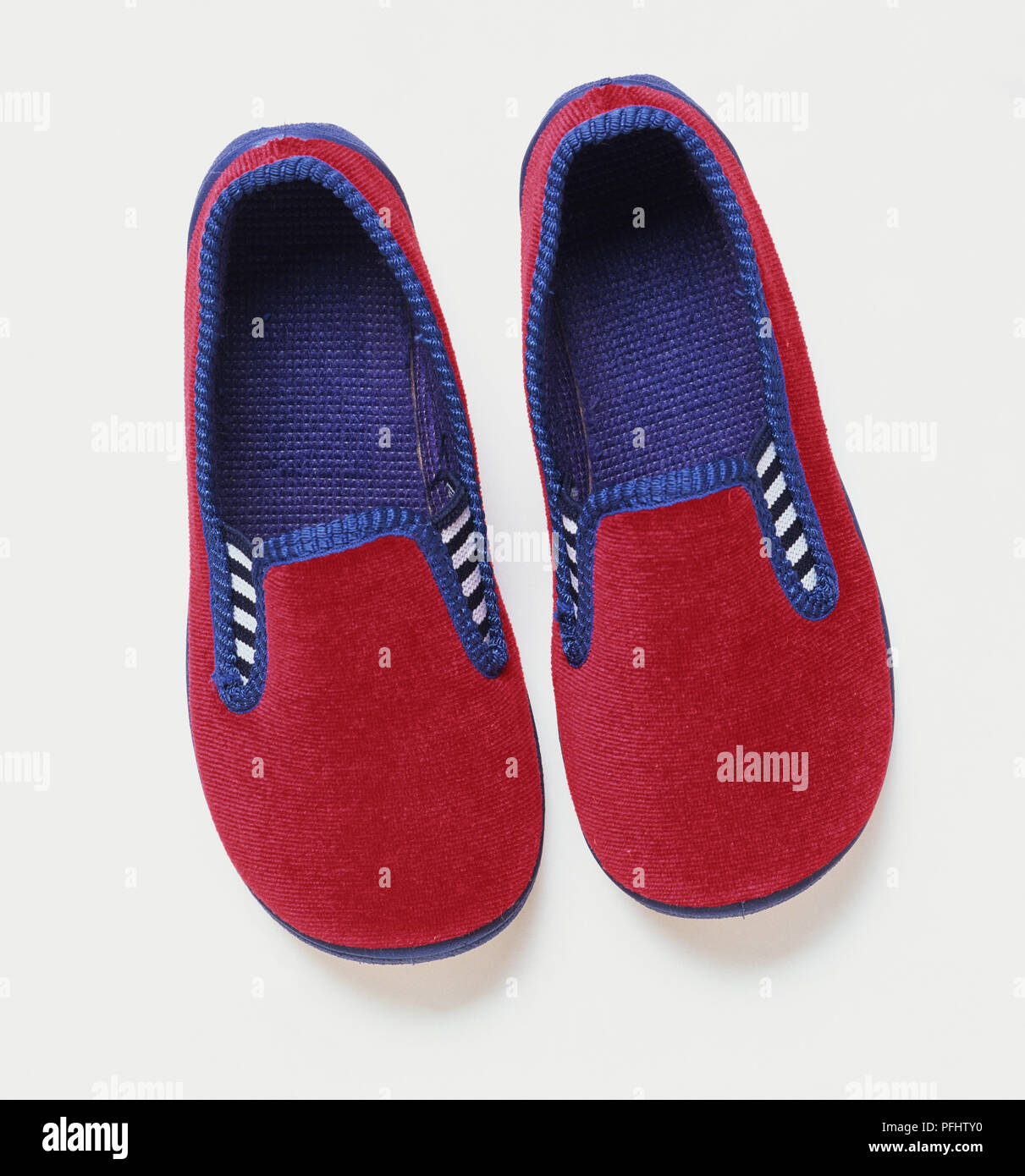 Pair of red and blue slippers, view from above Stock Photo - Alamy