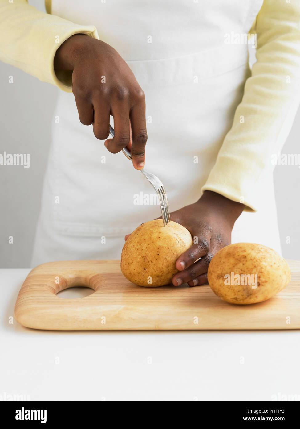 Fork pricking hi-res stock photography and images - Alamy