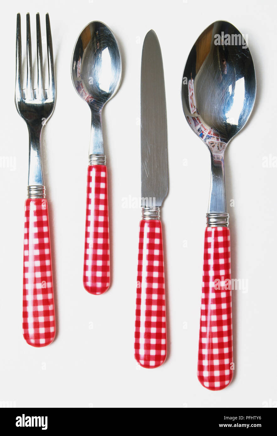 Cutlery, red and white chequered handles Stock Photo - Alamy