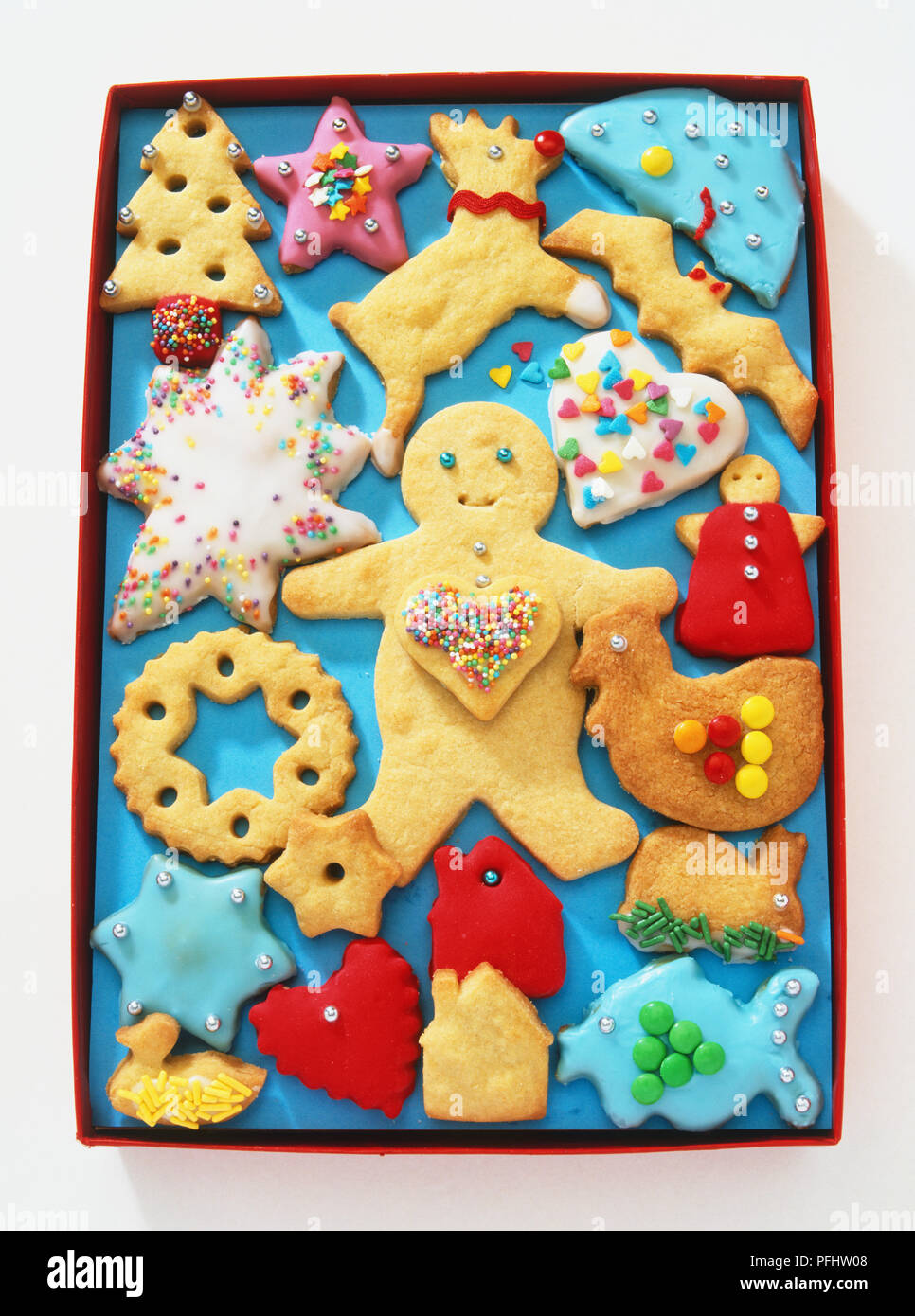 Multi-coloured iced biscuits on rectangular tray, view from above Stock ...