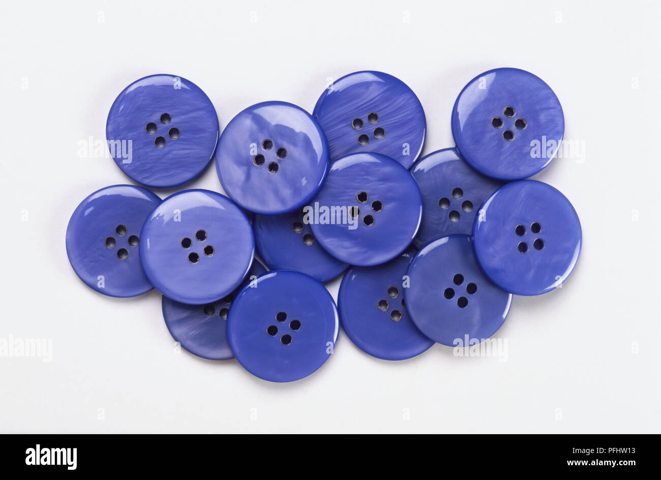 Pile of blue buttons, close up Stock Photo - Alamy