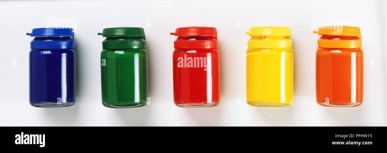 Five small pots of coloured poster paints Stock Photo - Alamy