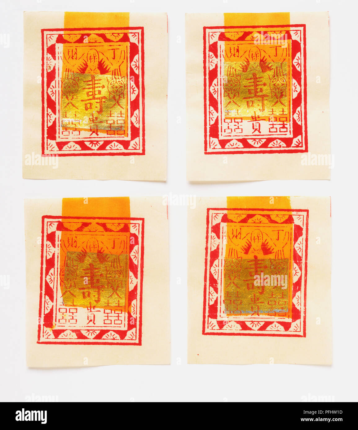 Chinese papers with colourful prints for ritual burning at a funeral ...