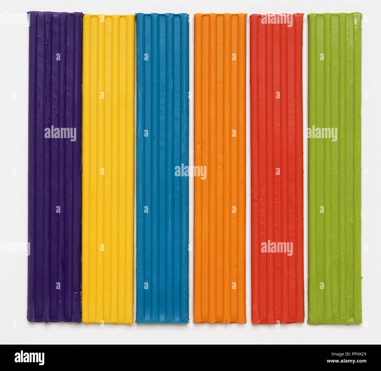 Strips of coloured plasticine, front view Stock Photo - Alamy