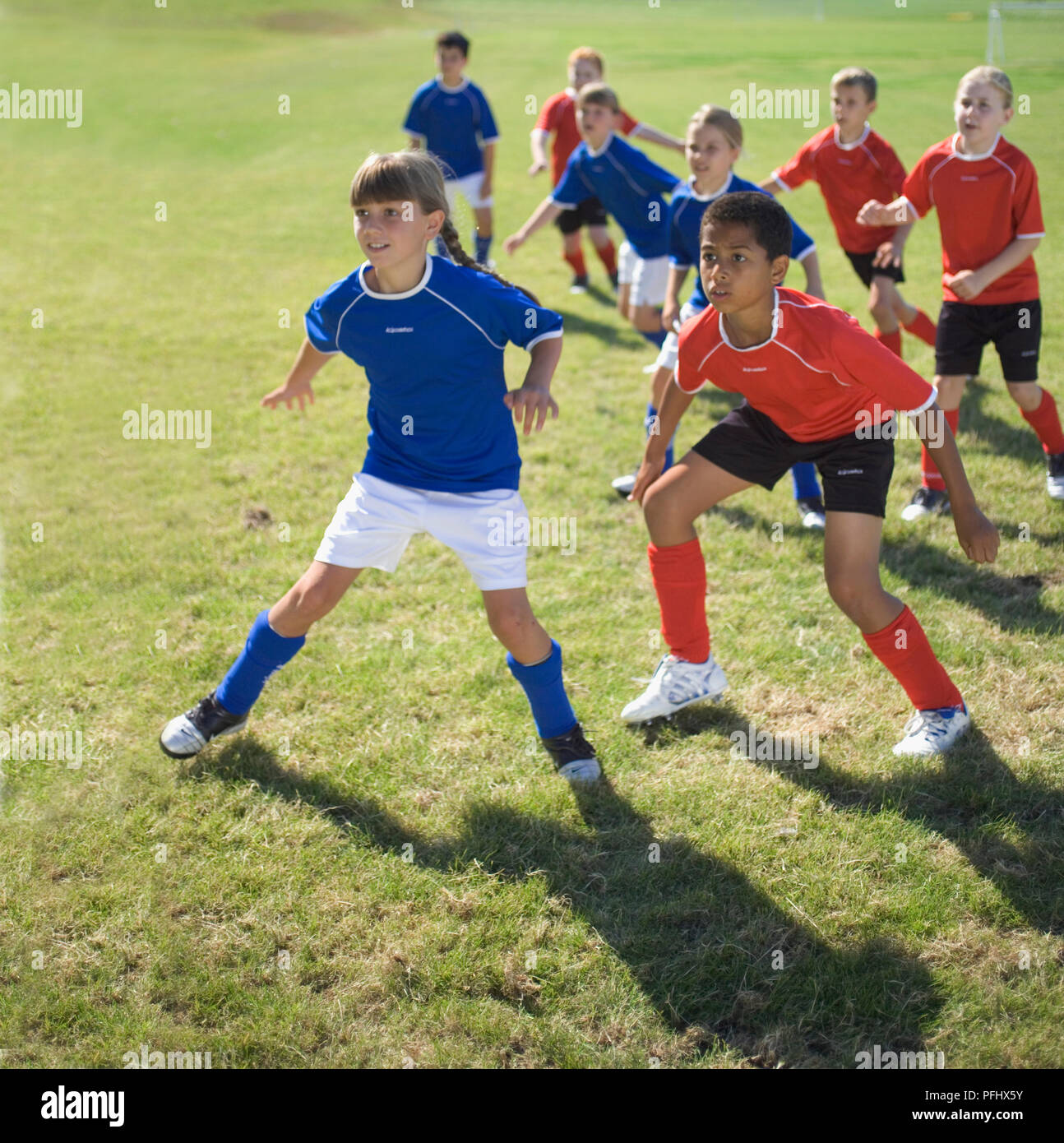 Players waiting for a corner kick beside the goal mouth, defenders ...