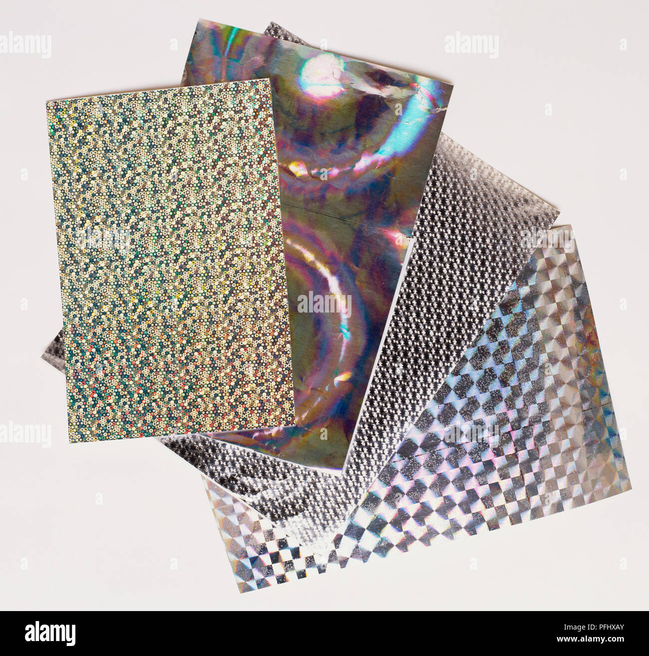 Hologramed silver papers with various patterns, front view Stock Photo ...