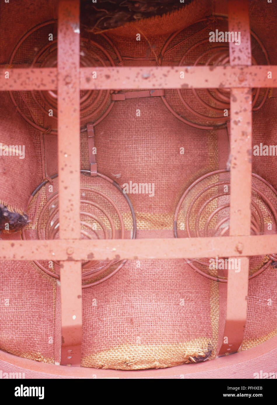 Rusty metal frame and springs underneath chair, view from below Stock ...