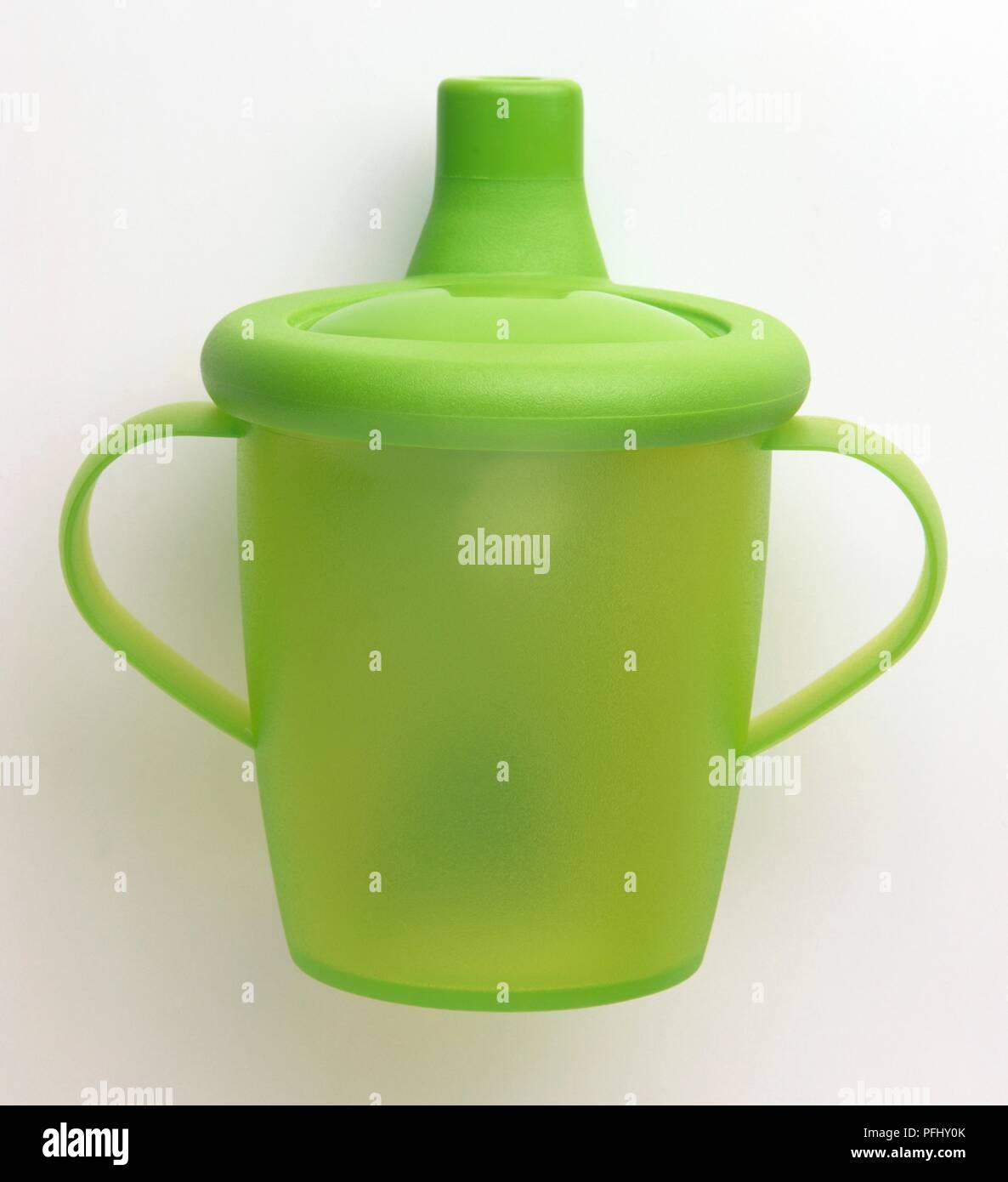 Green plastic baby cup Stock Photo - Alamy