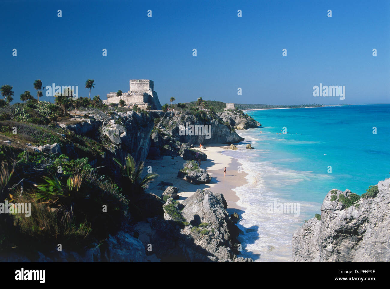 Mexico, Tulum, El Castillo, Mayan temple on top of a cliff on a rocky ...
