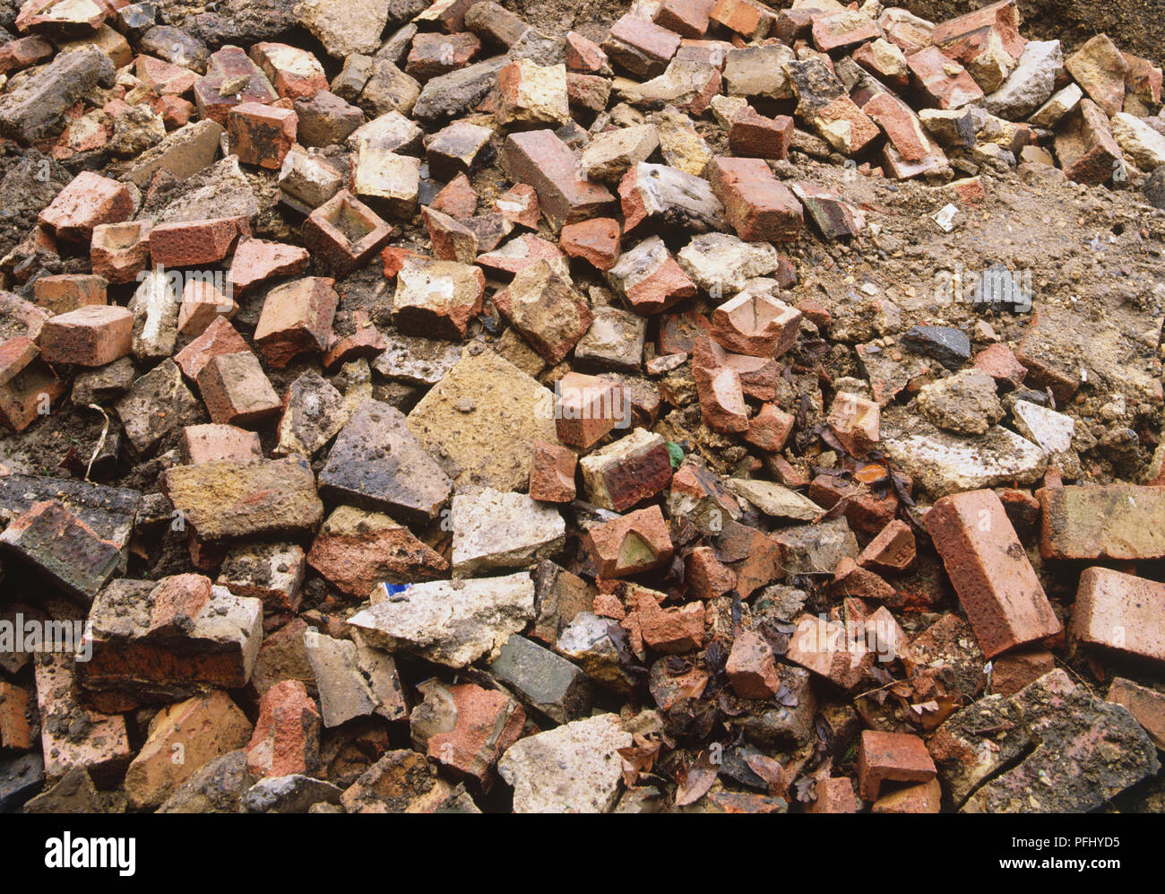 Pile of broken red bricks Stock Photo - Alamy