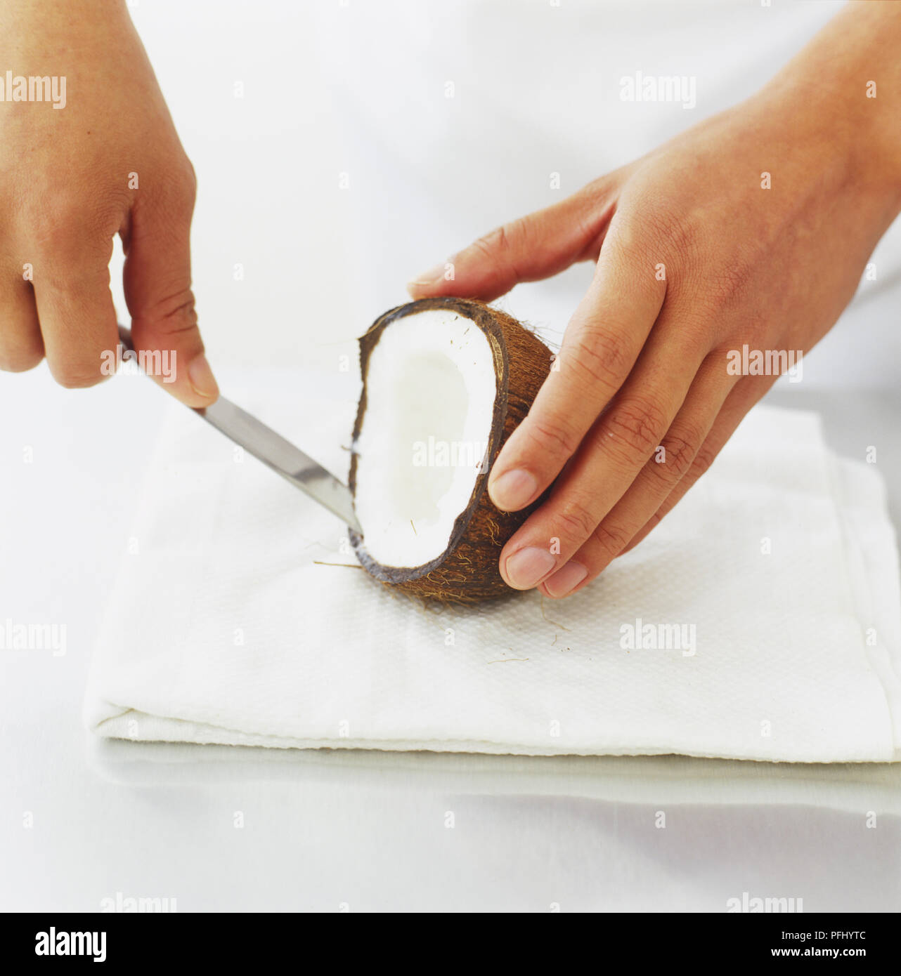 Cutting the coconut shell hi-res stock photography and images - Alamy