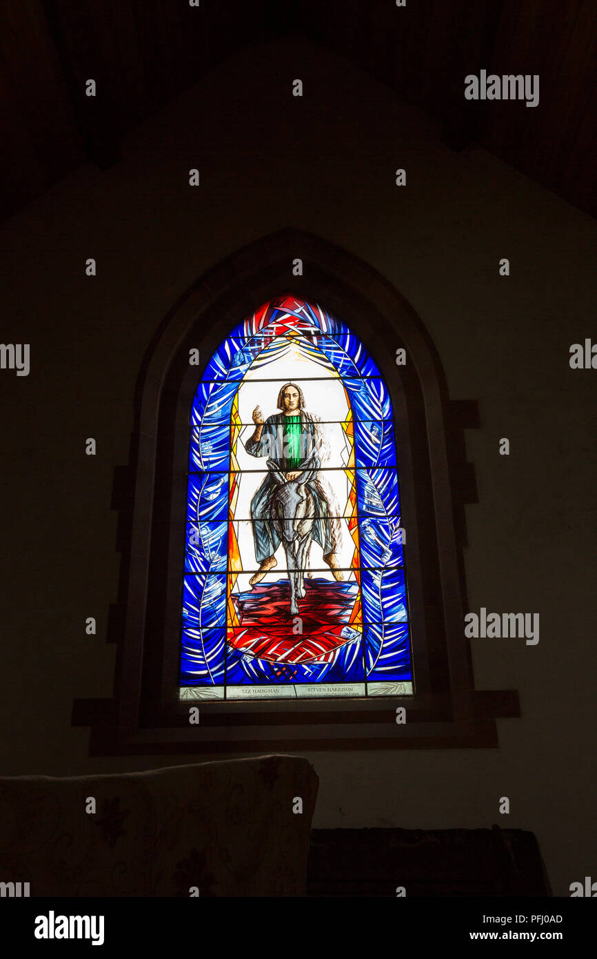 A stained glass window in Holme Cultram Abbey in Abbeytown, NW Cumbria ...