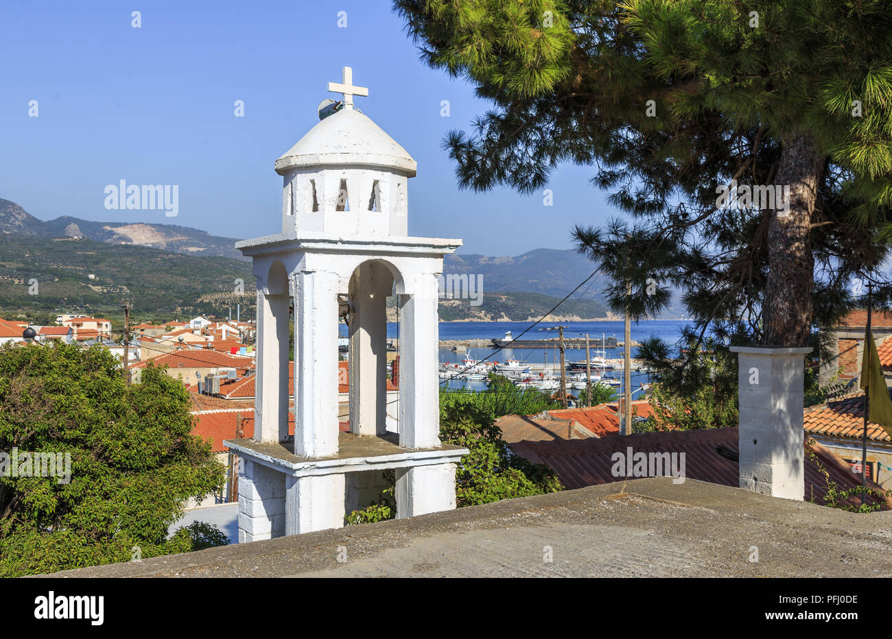 Small Orthodoxy Chapel over peaceful harbour, port & marina in Ormos ...