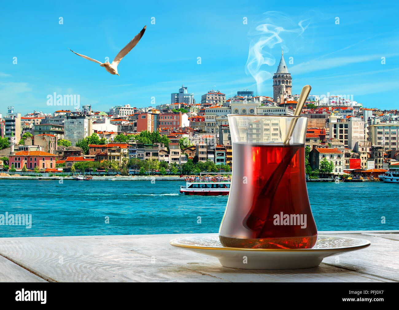 Traditional turkish apple tea on a background of cityscape Stock Photo ...
