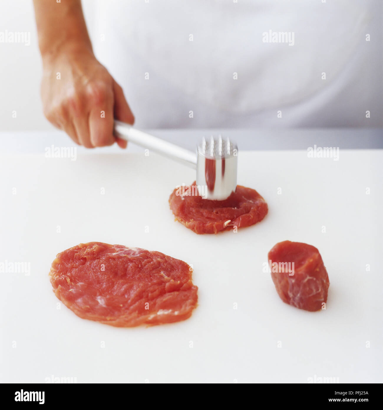 Pounding utensils hi-res stock photography and images - Alamy