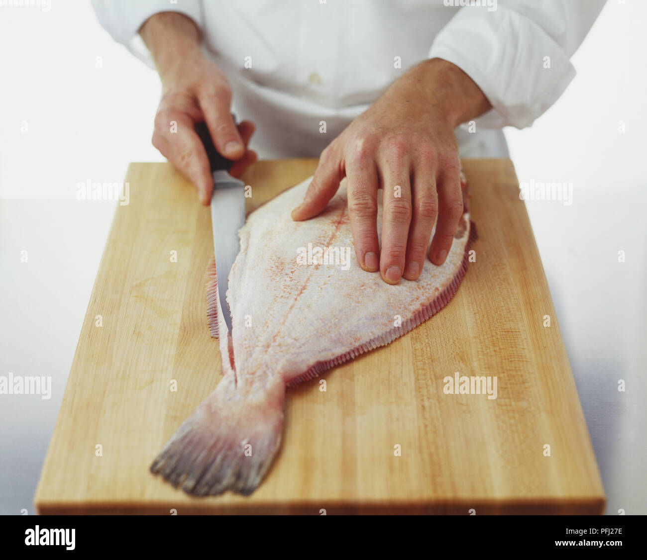 Skinning flat fish hi-res stock photography and images - Alamy
