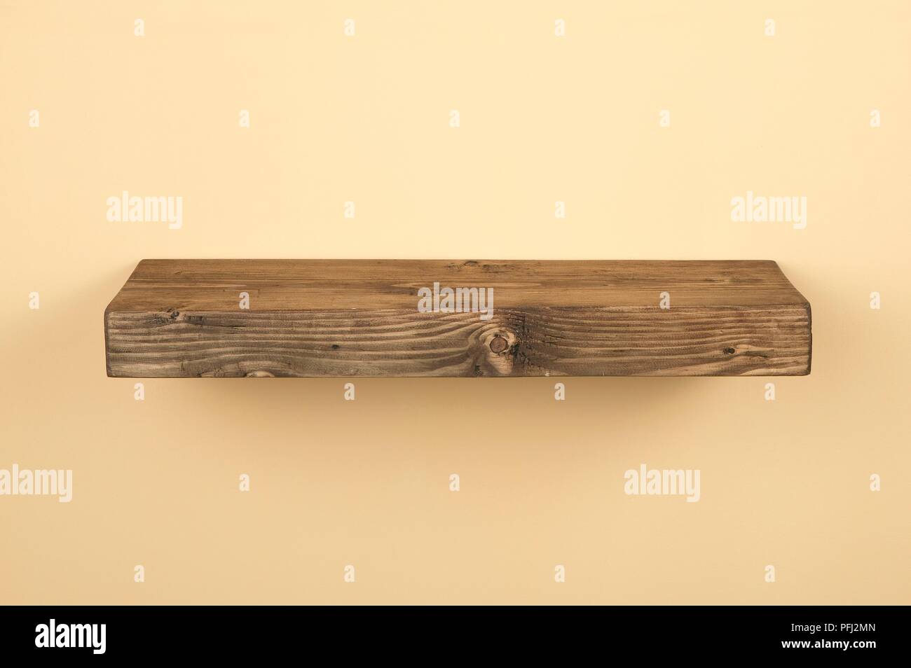 Wall-mounted, wooden book shelf, close-up Stock Photo - Alamy