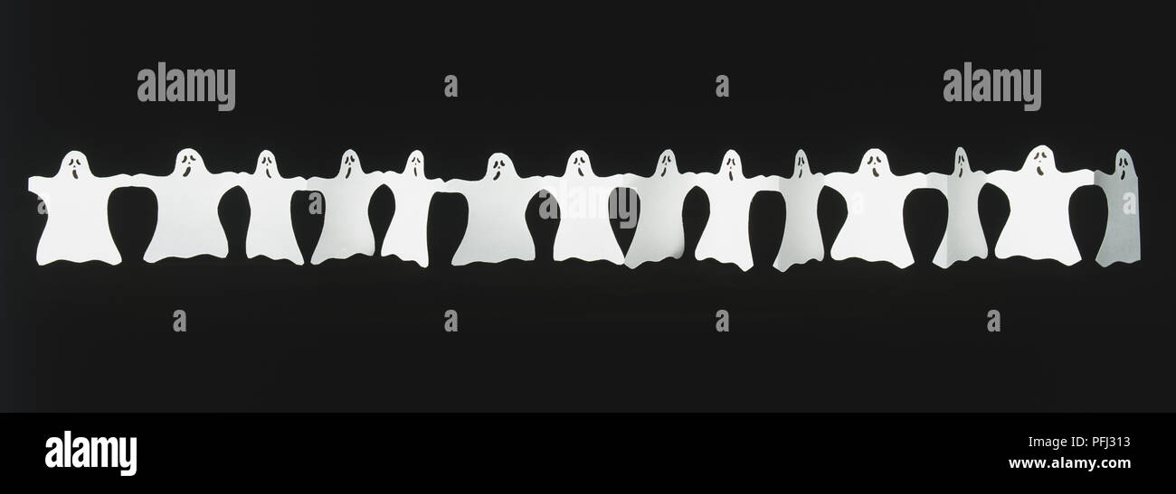 Cut out paper ghosts Stock Photo - Alamy