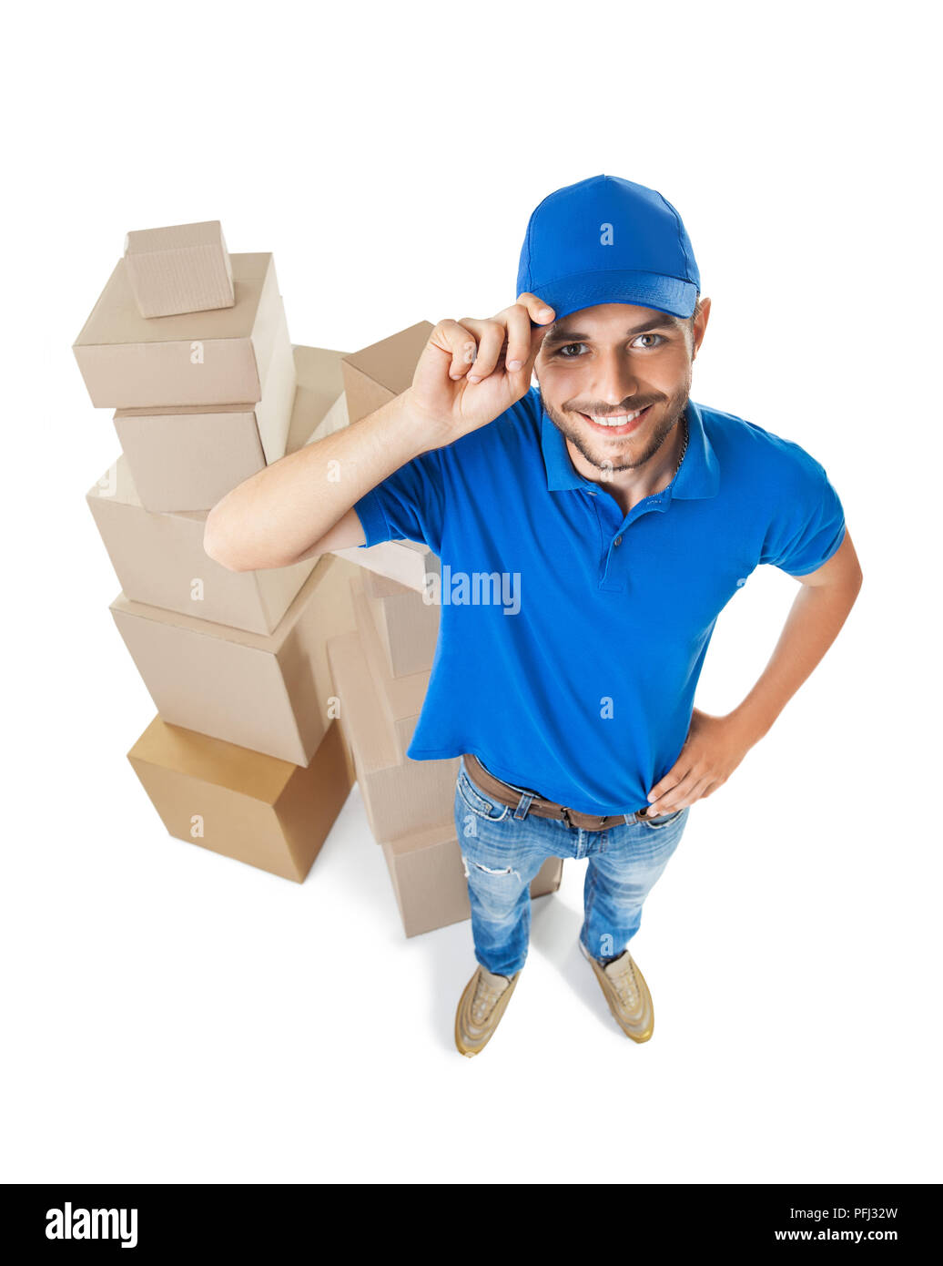 Fish eye shot of delivery man touching his cap in greeting isolated on ...