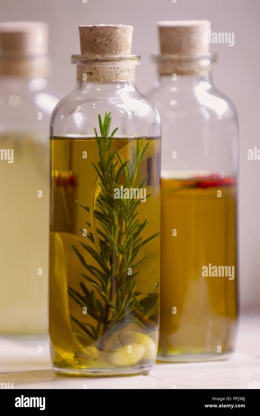 Bottles of flavoured oils Stock Photo - Alamy