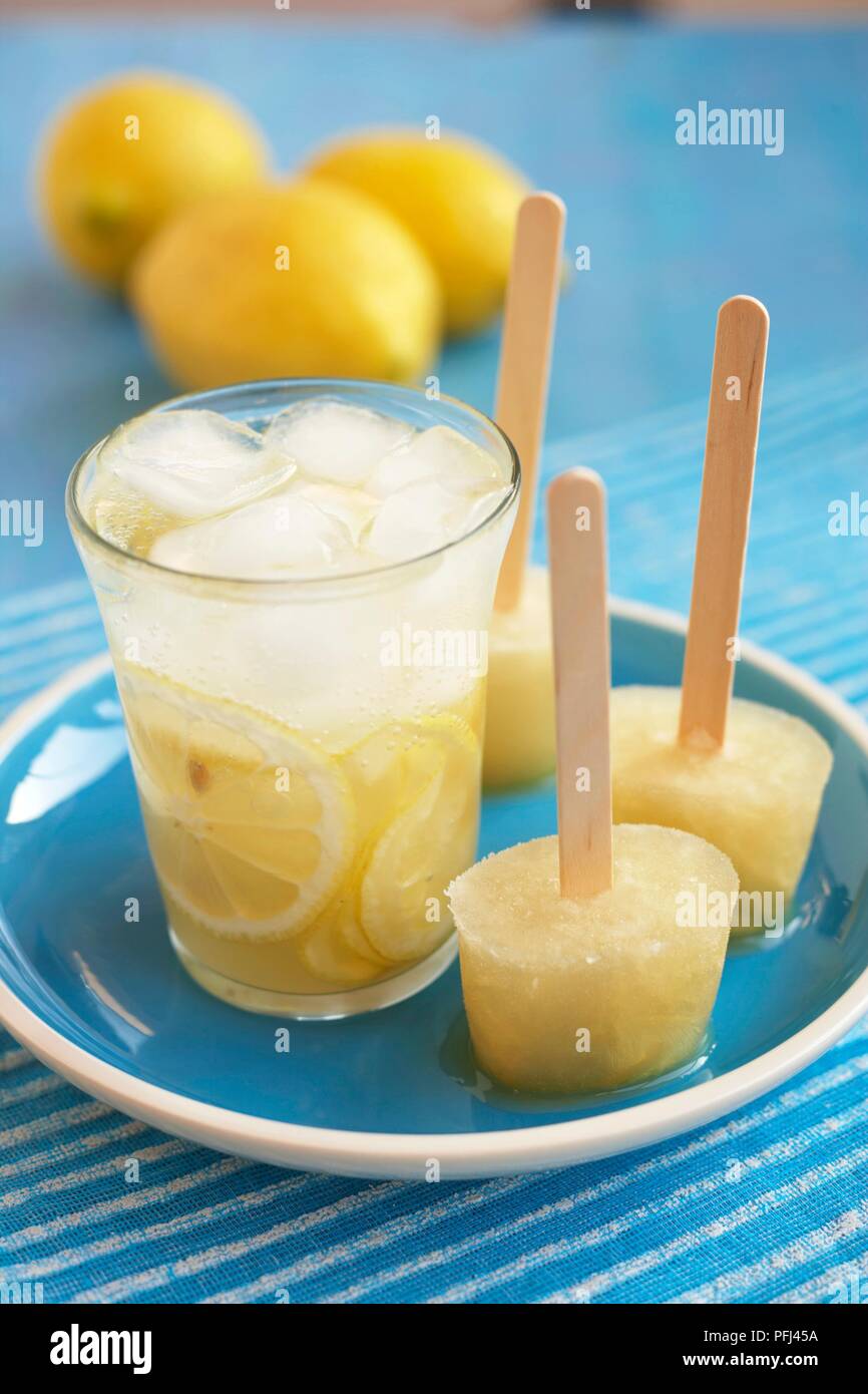 Yellow lemonade ice on background hi-res stock photography and images ...