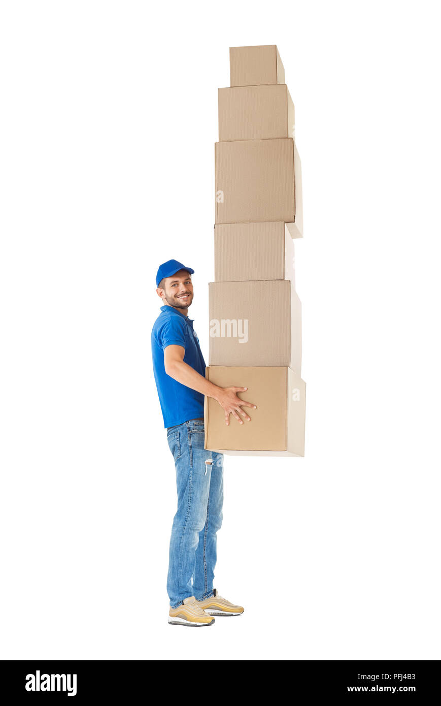 Full length profile portrait of courier carrying stack of boxes ...