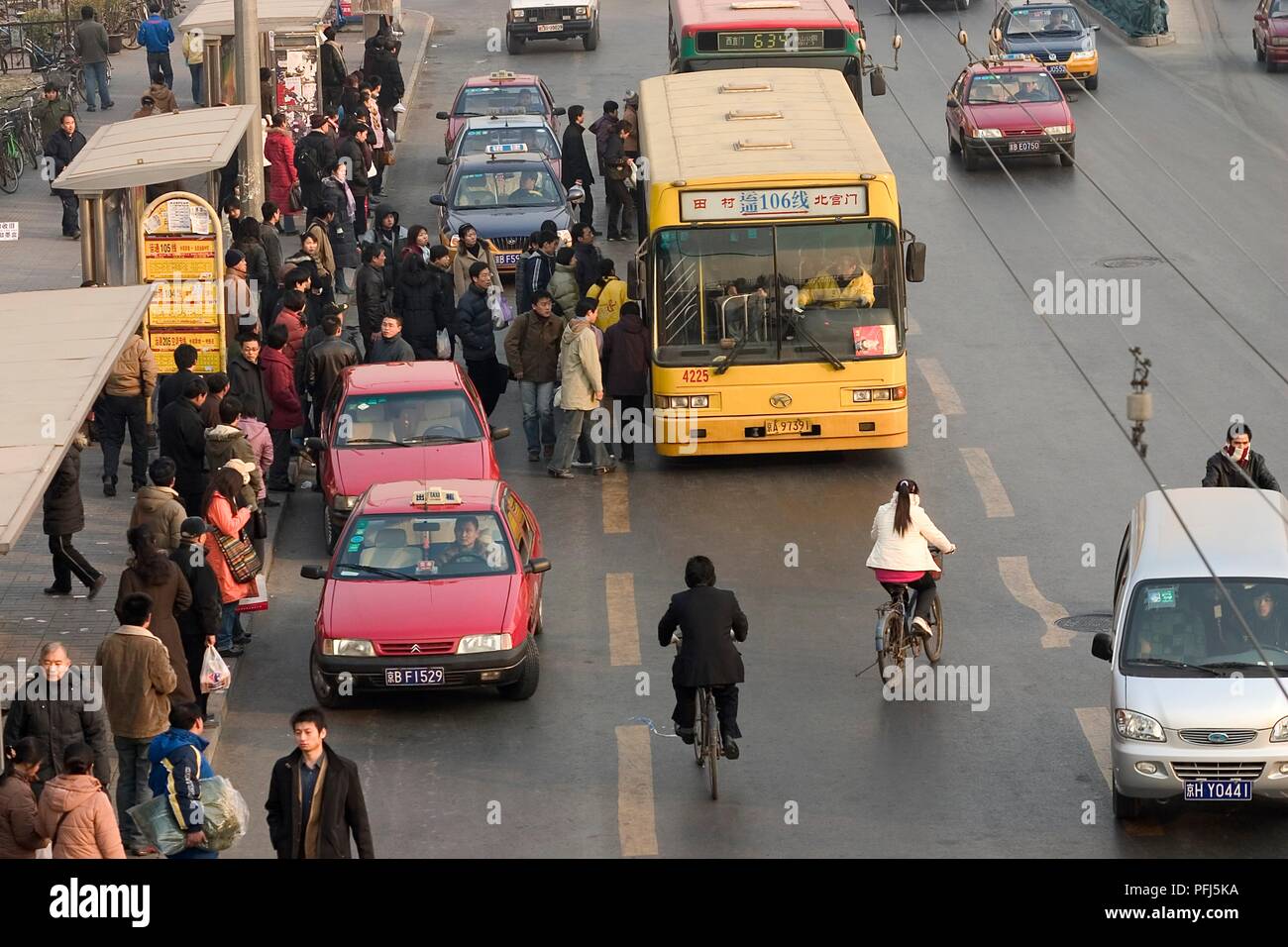 Women and men on bus china hi-res stock photography and images - Alamy