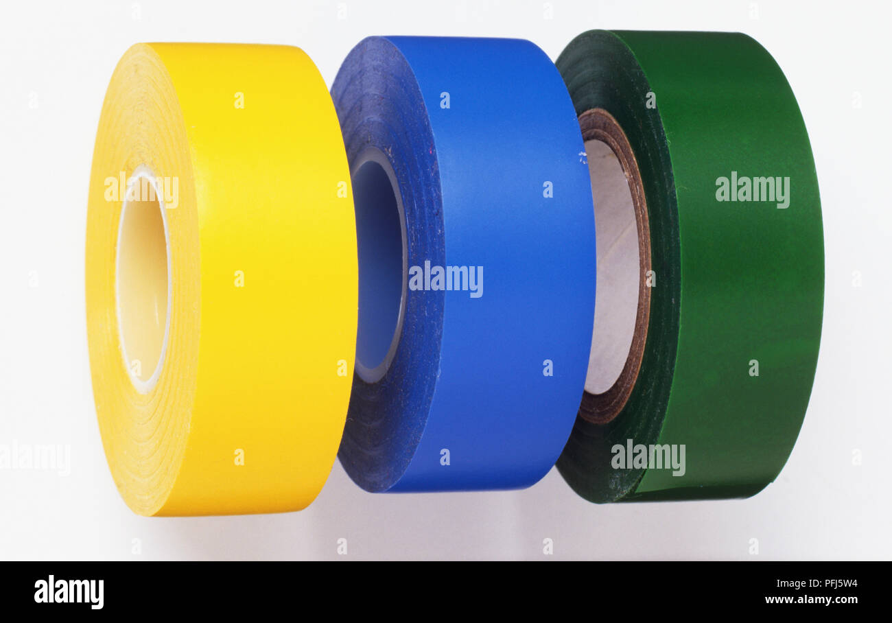 Three rolls of coloured sticky tape, yellow, blue and green Stock Photo ...