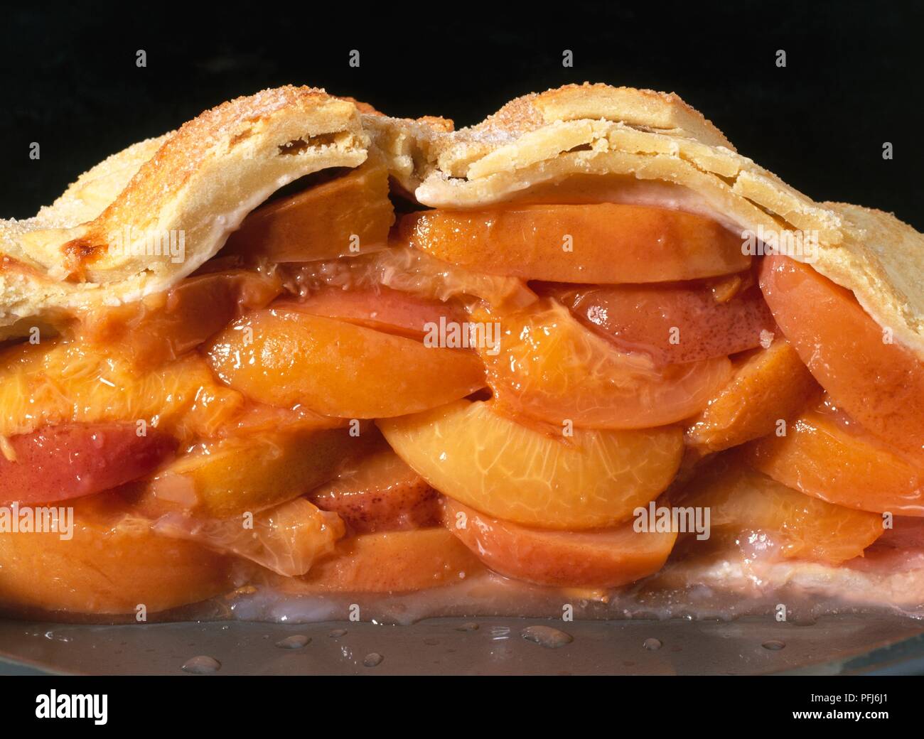 Peach pie, cross-section Stock Photo - Alamy
