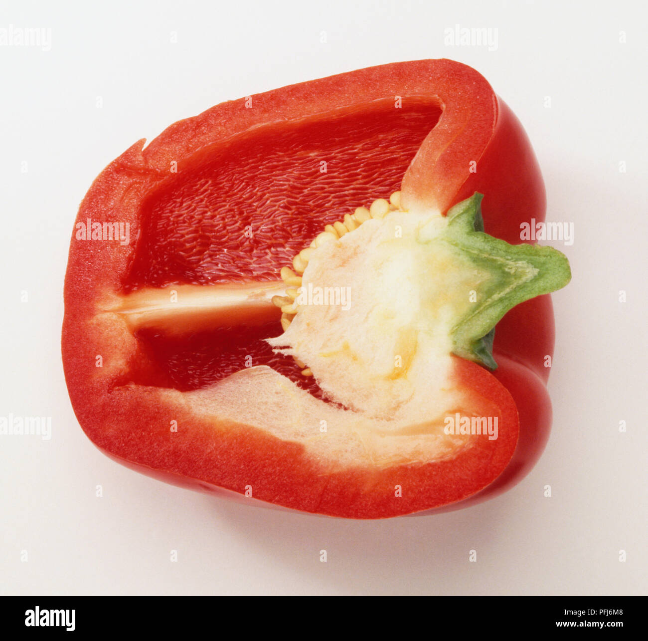 A red bell pepper cut in half Stock Photo - Alamy