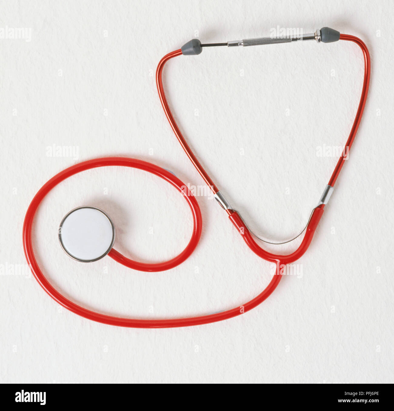 Red stethoscope, view from above Stock Photo - Alamy