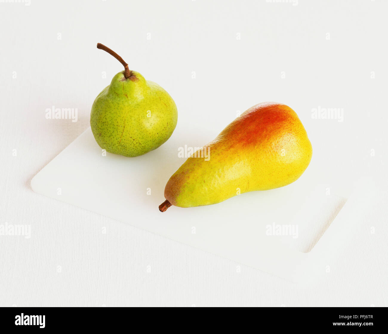Mango and Pear, elevated view Stock Photo - Alamy
