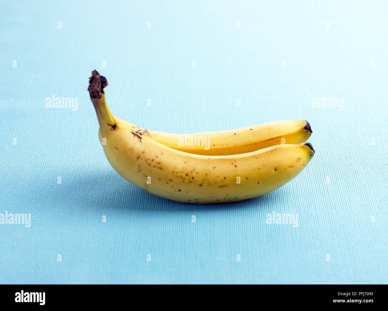 Two ripe yellow bananas Stock Photo - Alamy