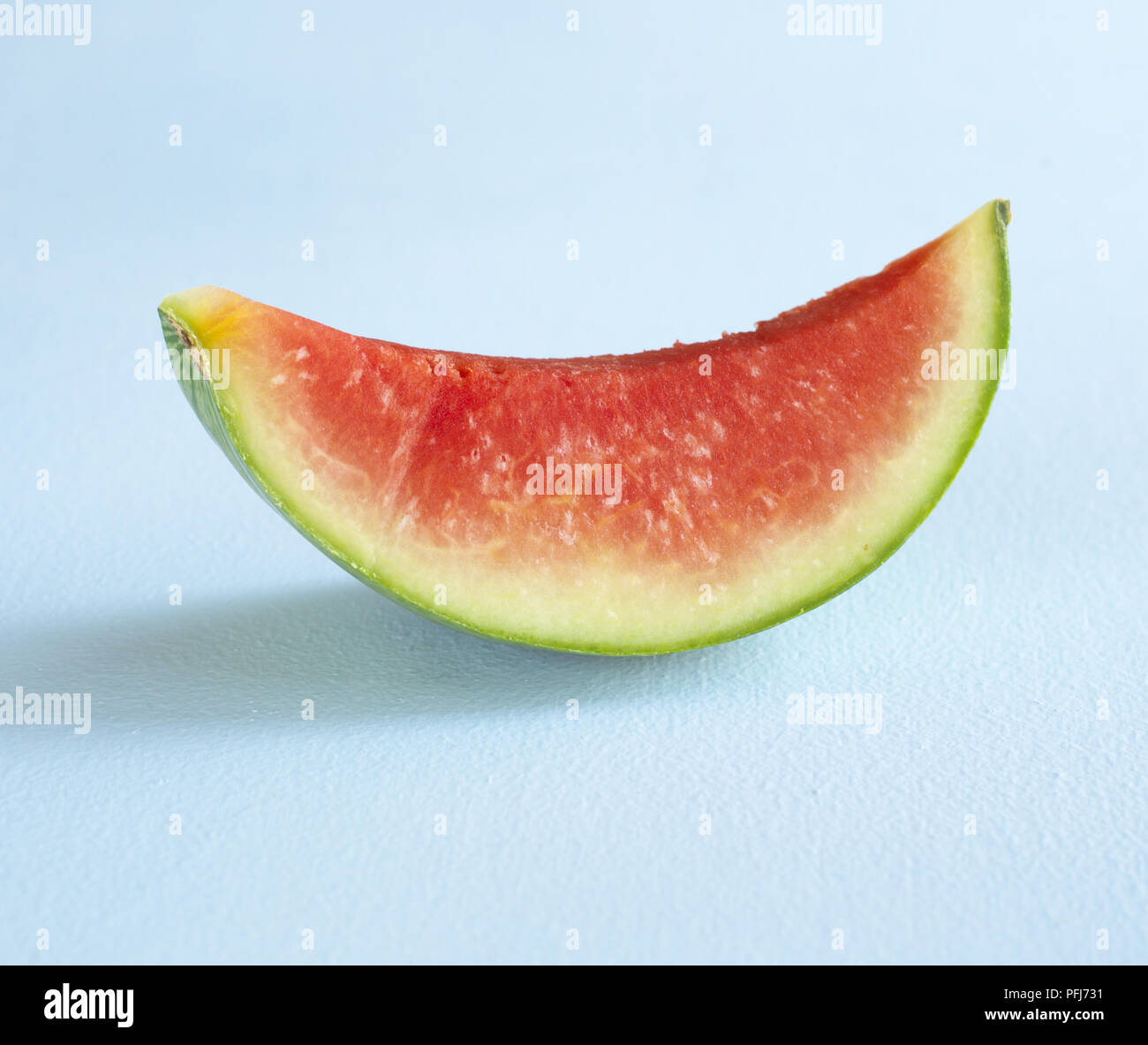 Citrullus lanatus, Watermelon, slice showing red flesh, side view Stock ...
