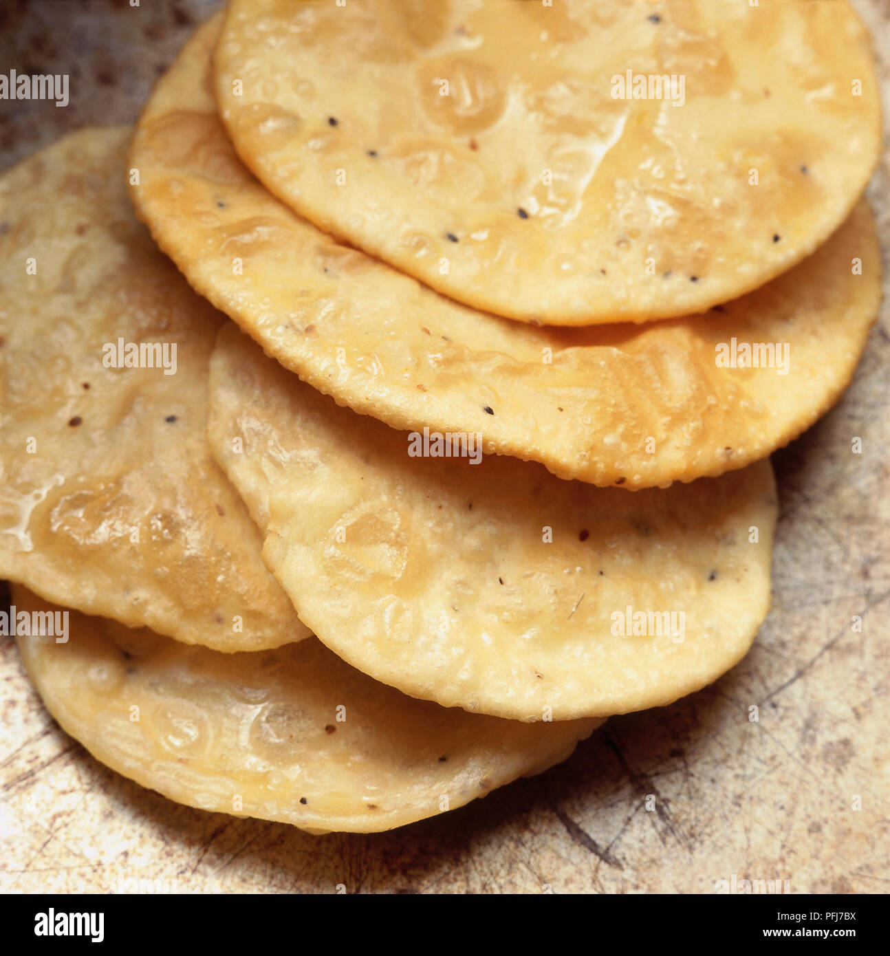 Stacks of fried bread (Poories Stock Photo - Alamy