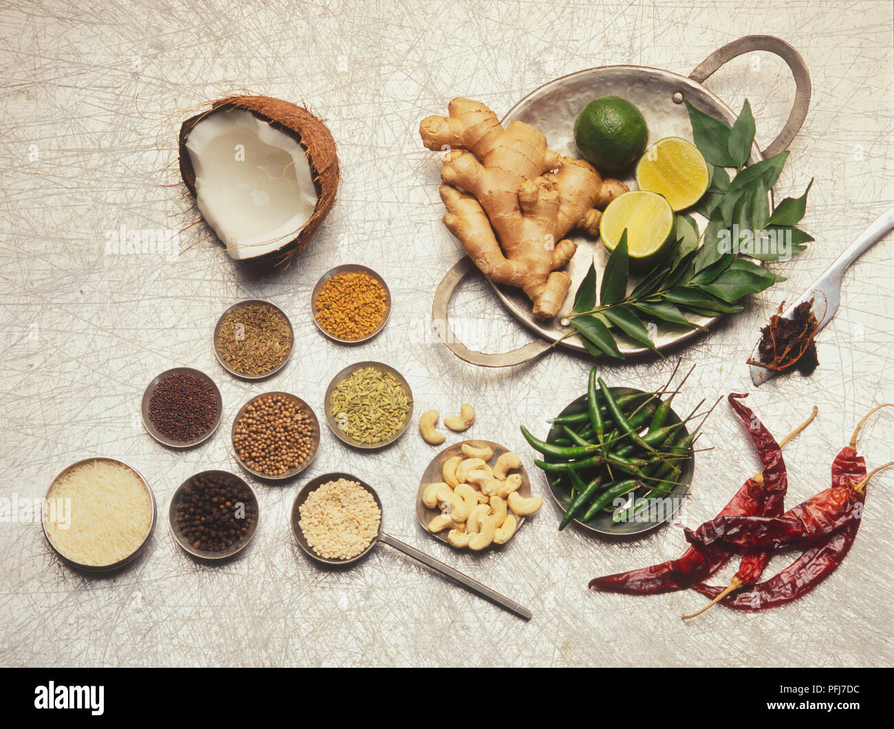 Selection of ingredients typical for South India, spices, grains ...