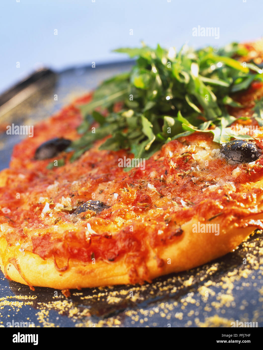 Round pizza with thick chewy crust, topped with tomato sauce, cheese ...