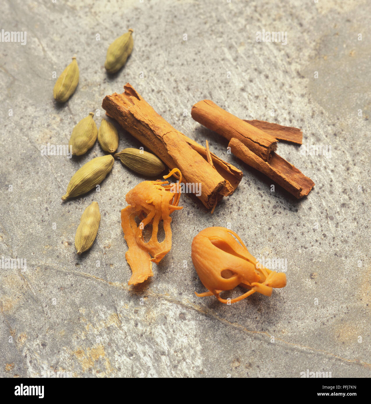 Cinnamon stalks, cardamom pods and blades mace, view from above Stock ...