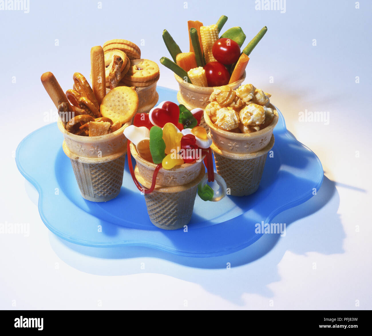Flat-based wafer cones filled with selection of sweet and savoury ...